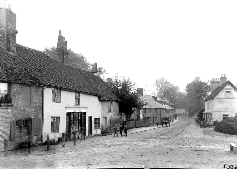 From Vol 5 Slide 1362 Tring: Old Houses and Road. A B&W photograph of a ...